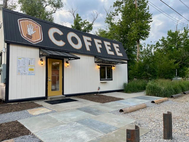 Asheville coffee company reopens Woodfin location for first time after ...