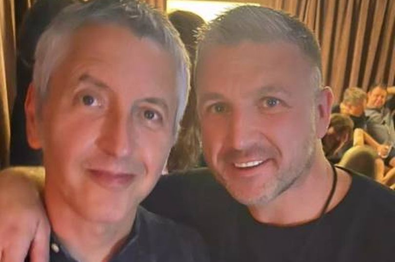 Notorious gangster pictured with Noel Gallagher backstage at Oasis gig