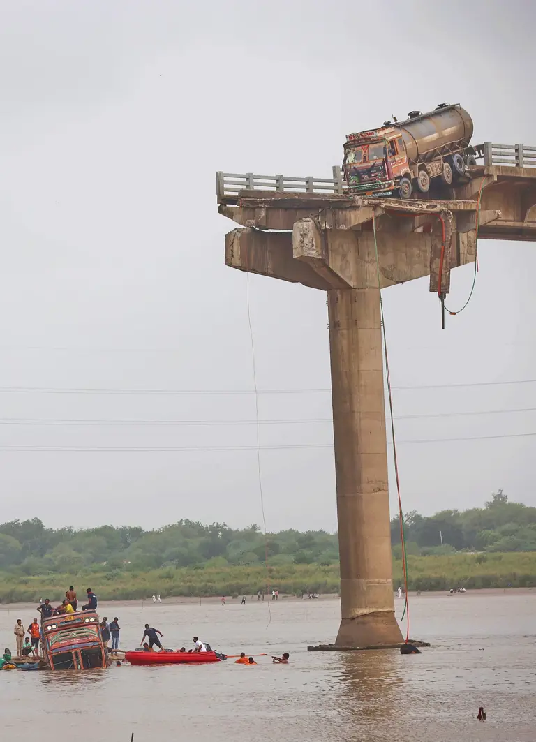 Gujarat bridge collapse: 9 dead as multiple vehicles fall into ...
