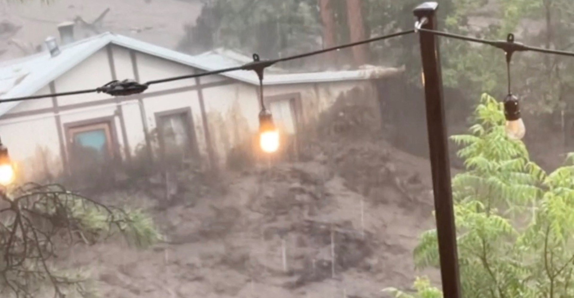 At least three dead in flood in US summer retreat