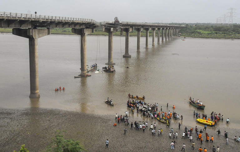 2 siblings among 10 killed as vehicles fall into river after part of ...