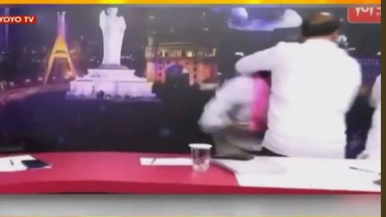 Congress Leader Gets Into Fistfight With BRS Opponent On Live TV - WATCH