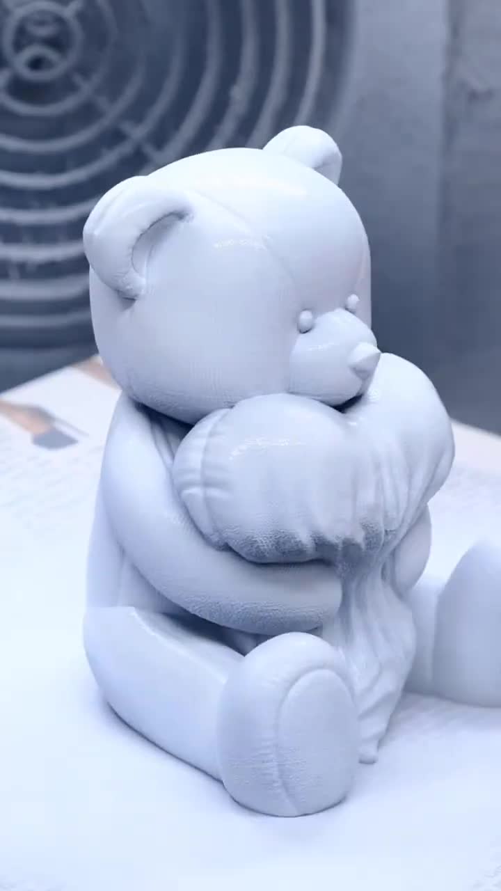Watch this bear change color right before your eyes