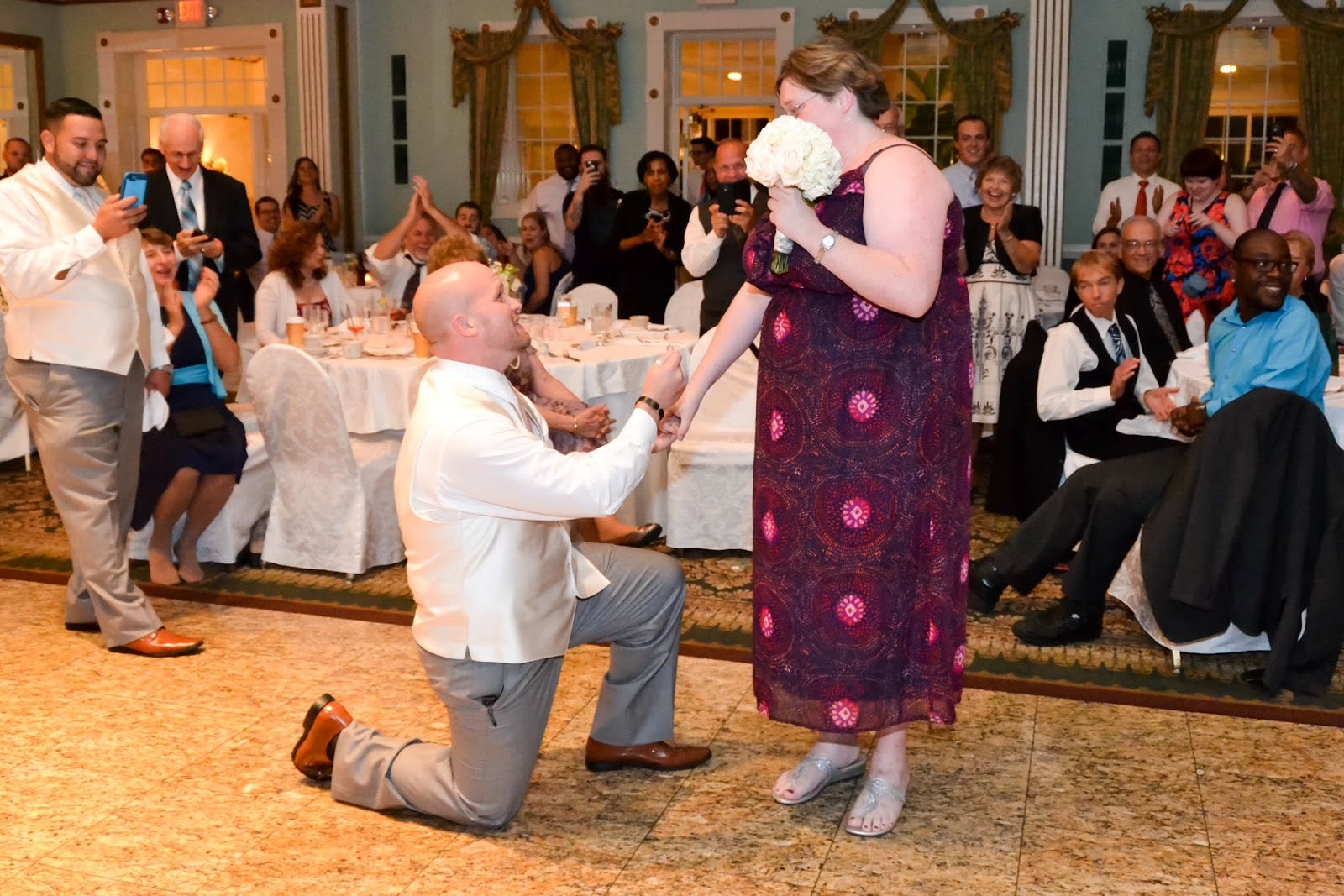 I let my friends get engaged at my wedding. The surprise proposal was ...