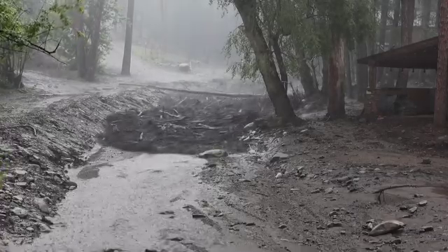 Watch as wall of water moves through as flash flood begins in Ruidoso ...