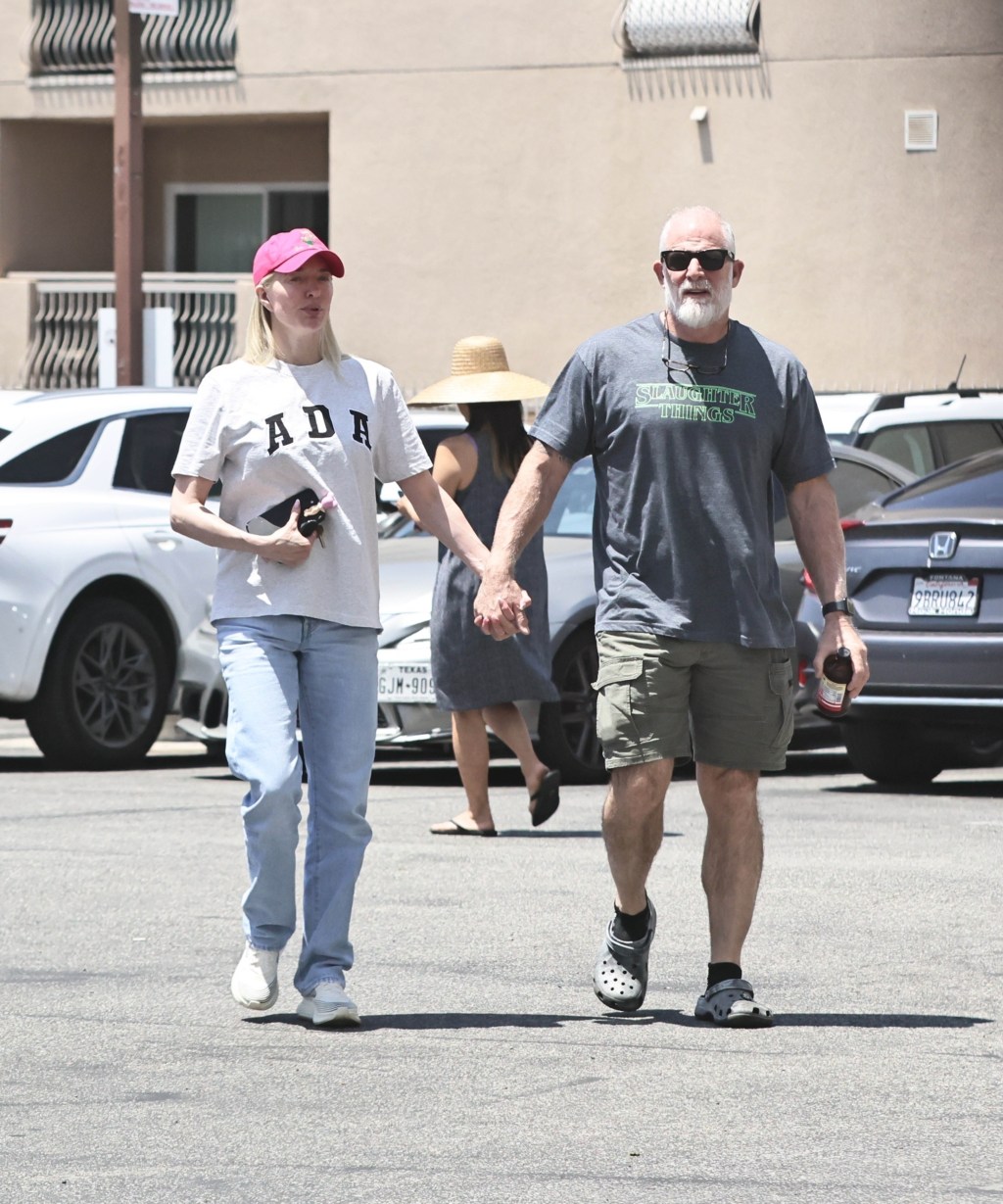 Erika Jayne holds hands with bodyguard beau John ‘Shrek’ McPhee as Tom ...