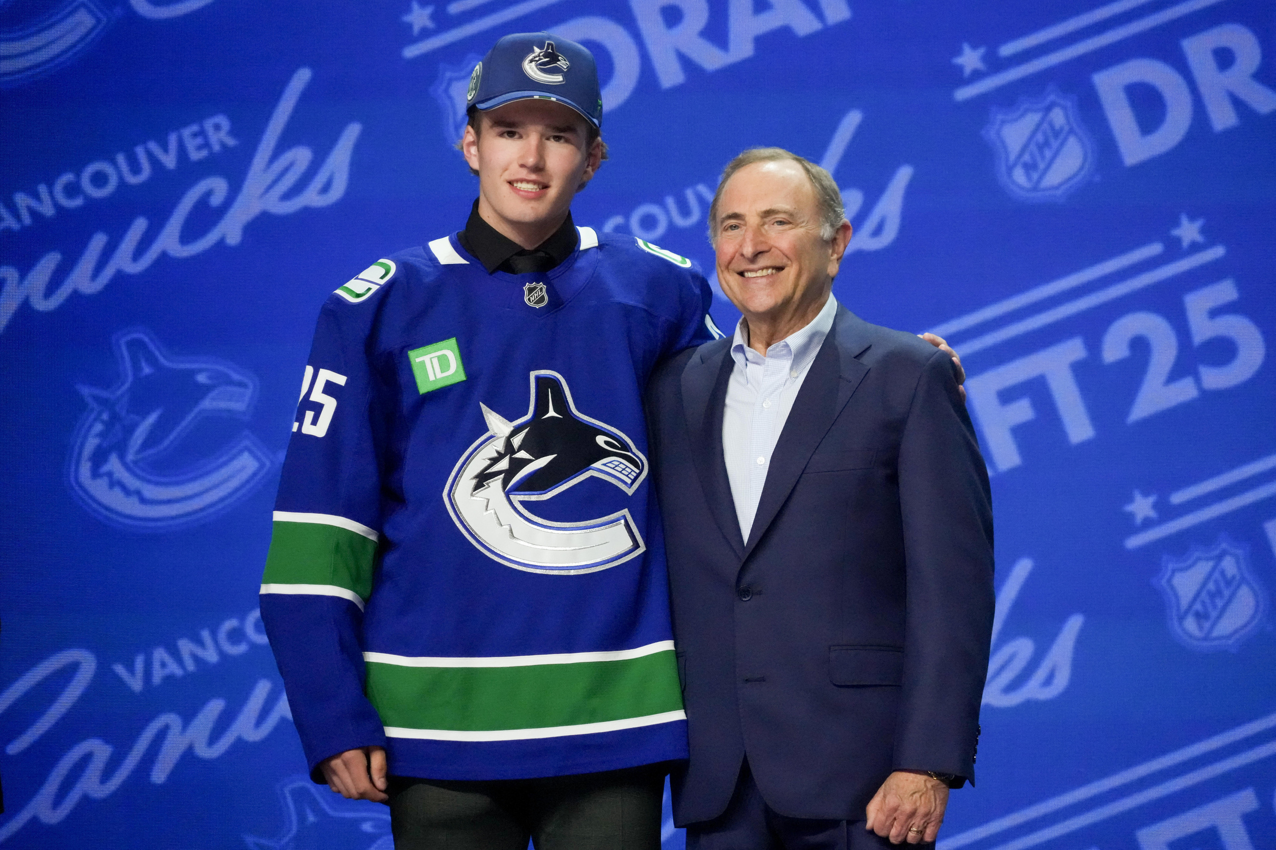 Canucks sign first-round pick to entry-level contract