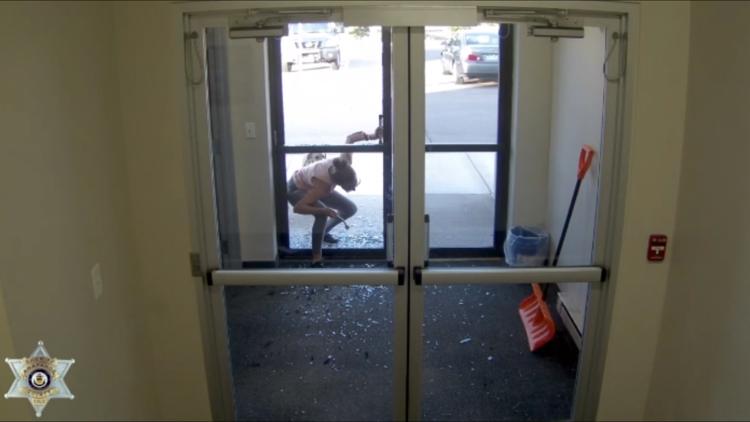 Video captures woman trying to break into building in Centennial