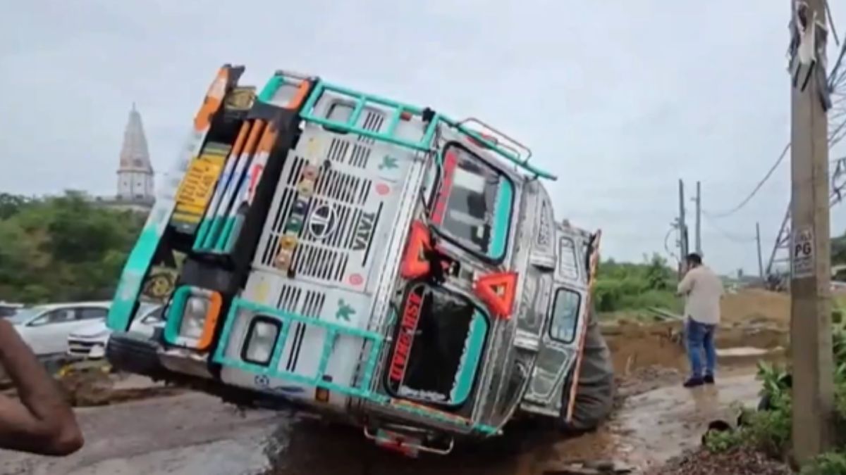 VIDEO: Truck Falls Into Giant Ditch In Gurugram As Road Caves In After ...
