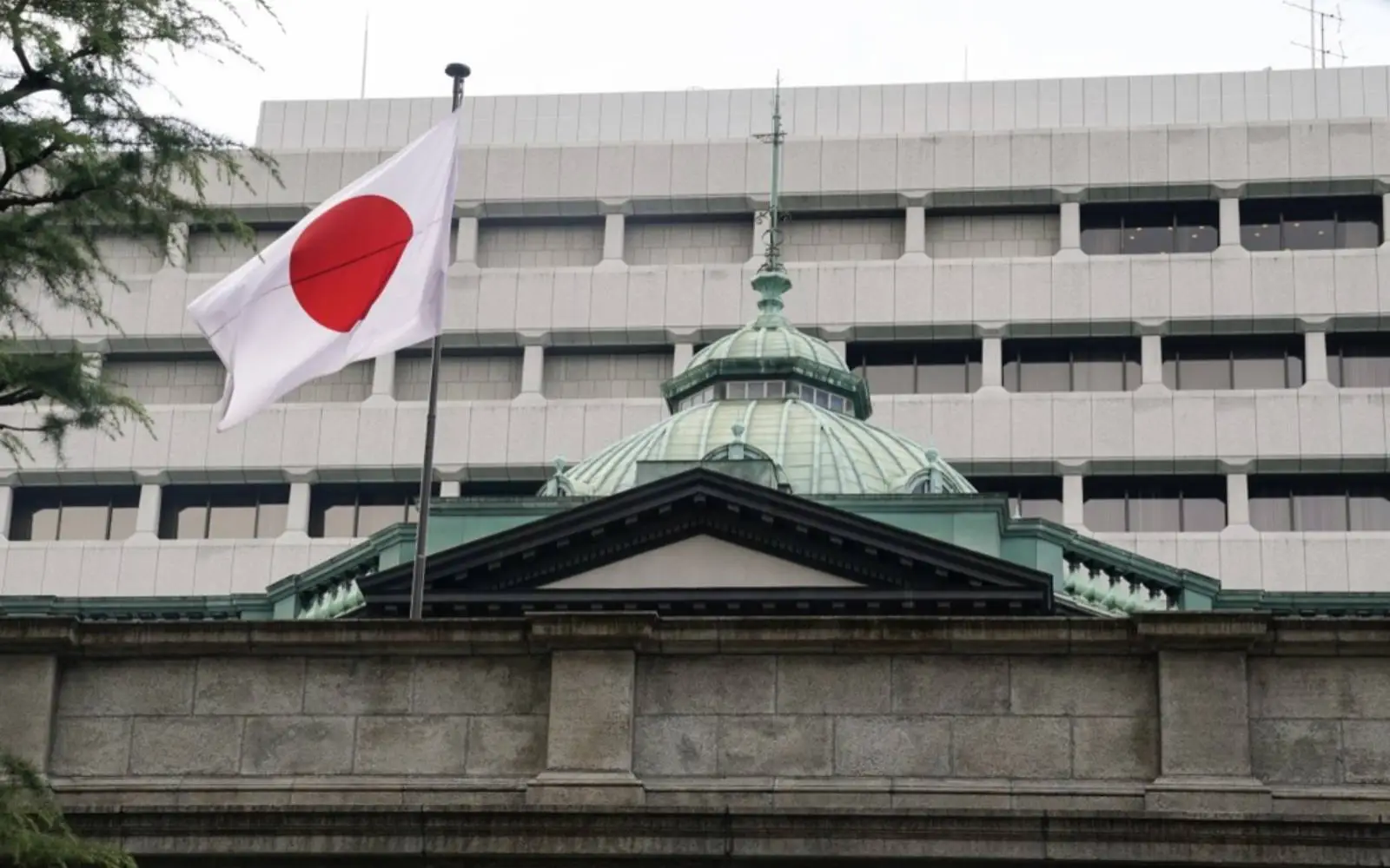 Japan expects growth to accelerate next year with fiscal stimulus