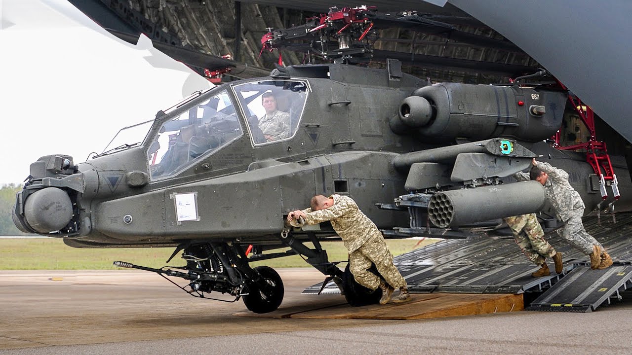 Massive US Attack Helicopter Unloaded from Giant Military Transport