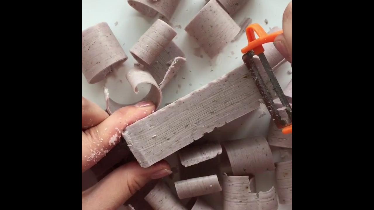 Satisfyingly Mottled White Bar Soap Shredding