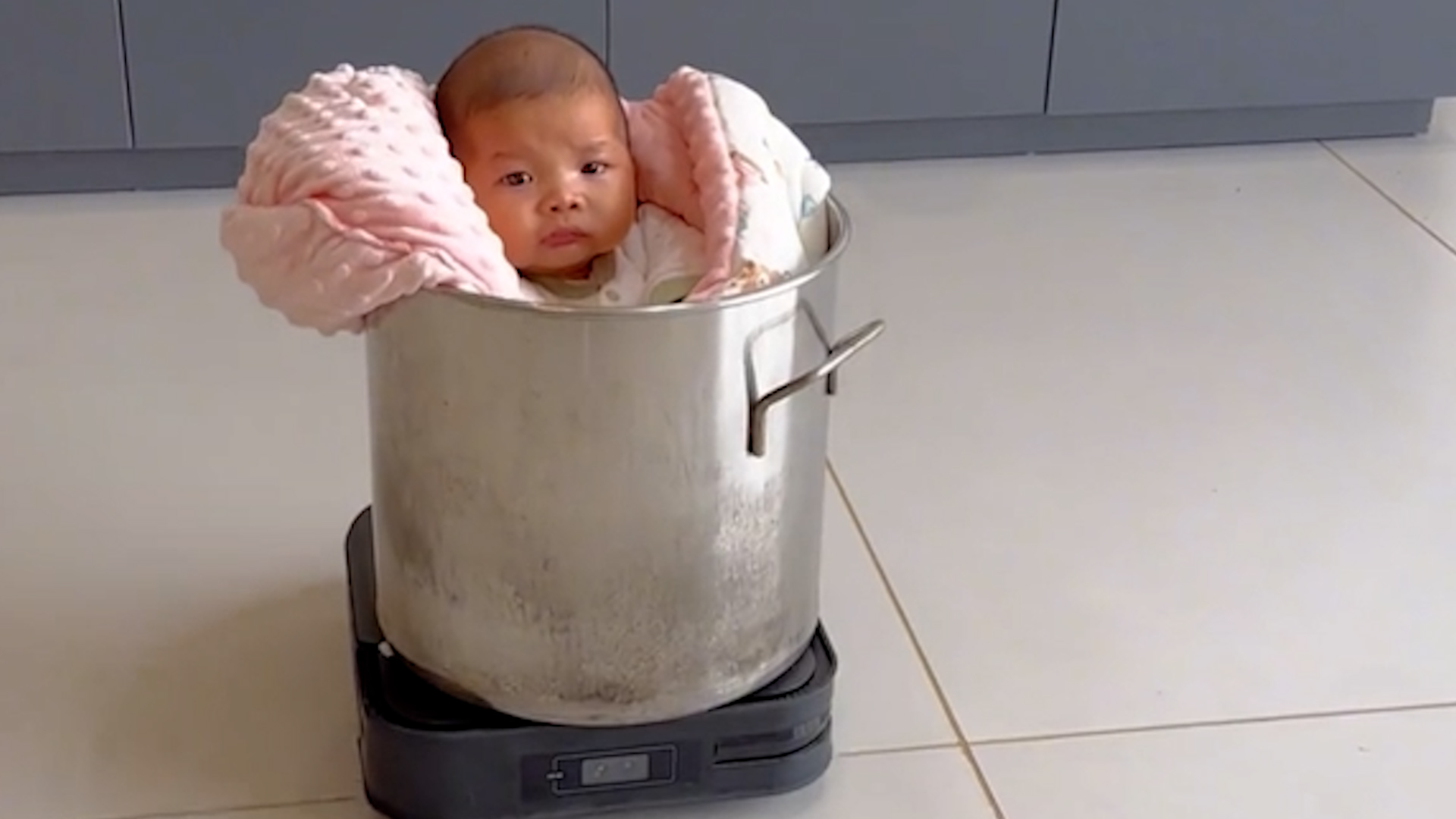 Dad's genius hack to stop baby from crying - a robot vacuum ride