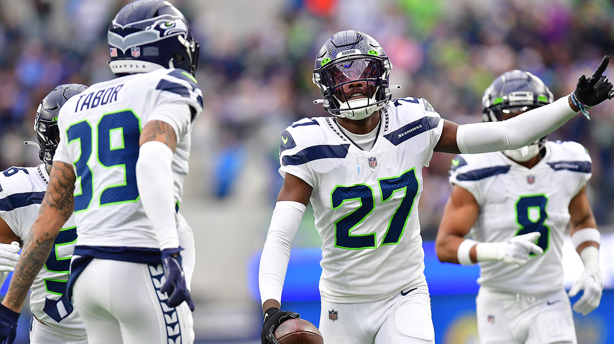 NFL rumors: Why teams believe Seahawks will make Riq Woolen available ...