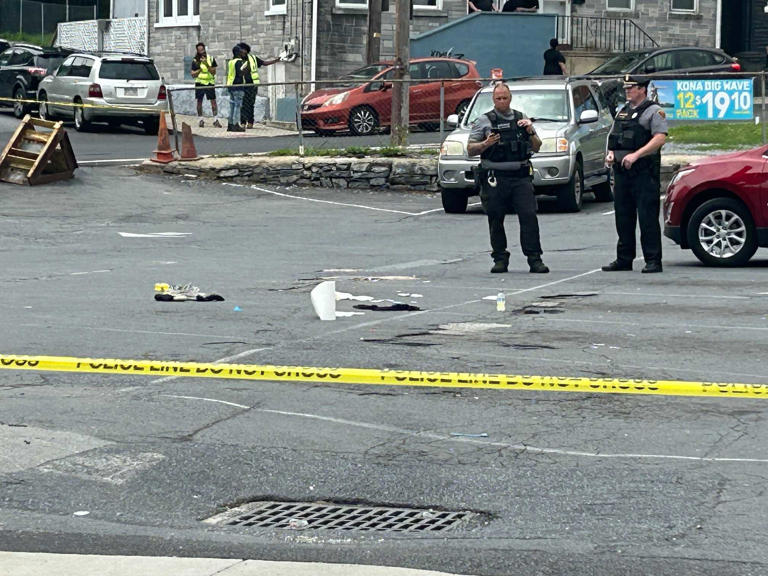 POLICE INCIDENT | Police tape surrounding area, emergency crews on scene