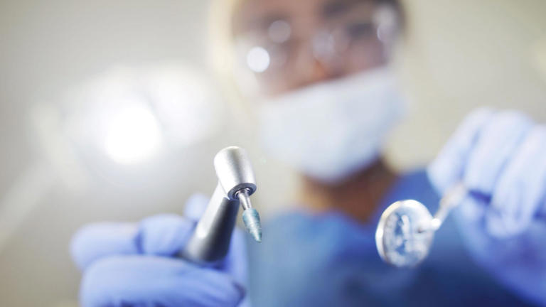 What are the risks of dental tourism?