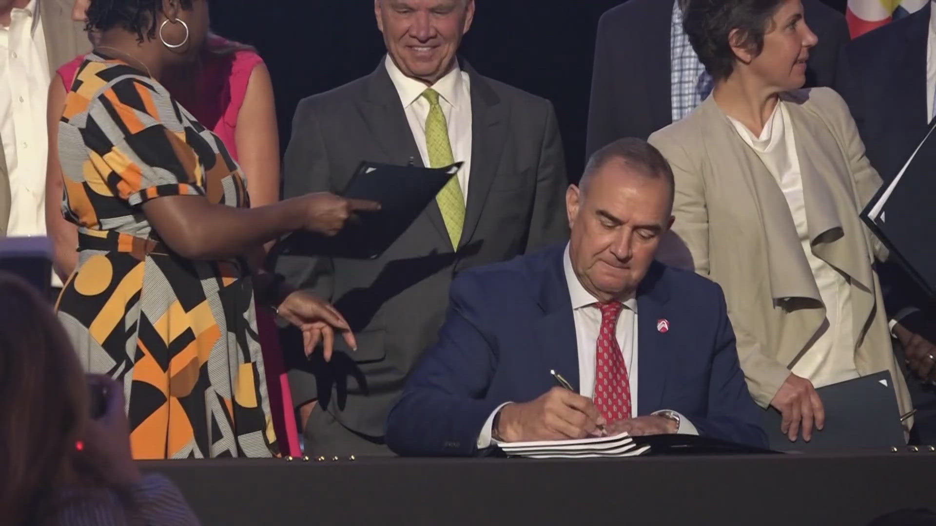 Gov. Mike Kehoe signs two bills in St. Louis
