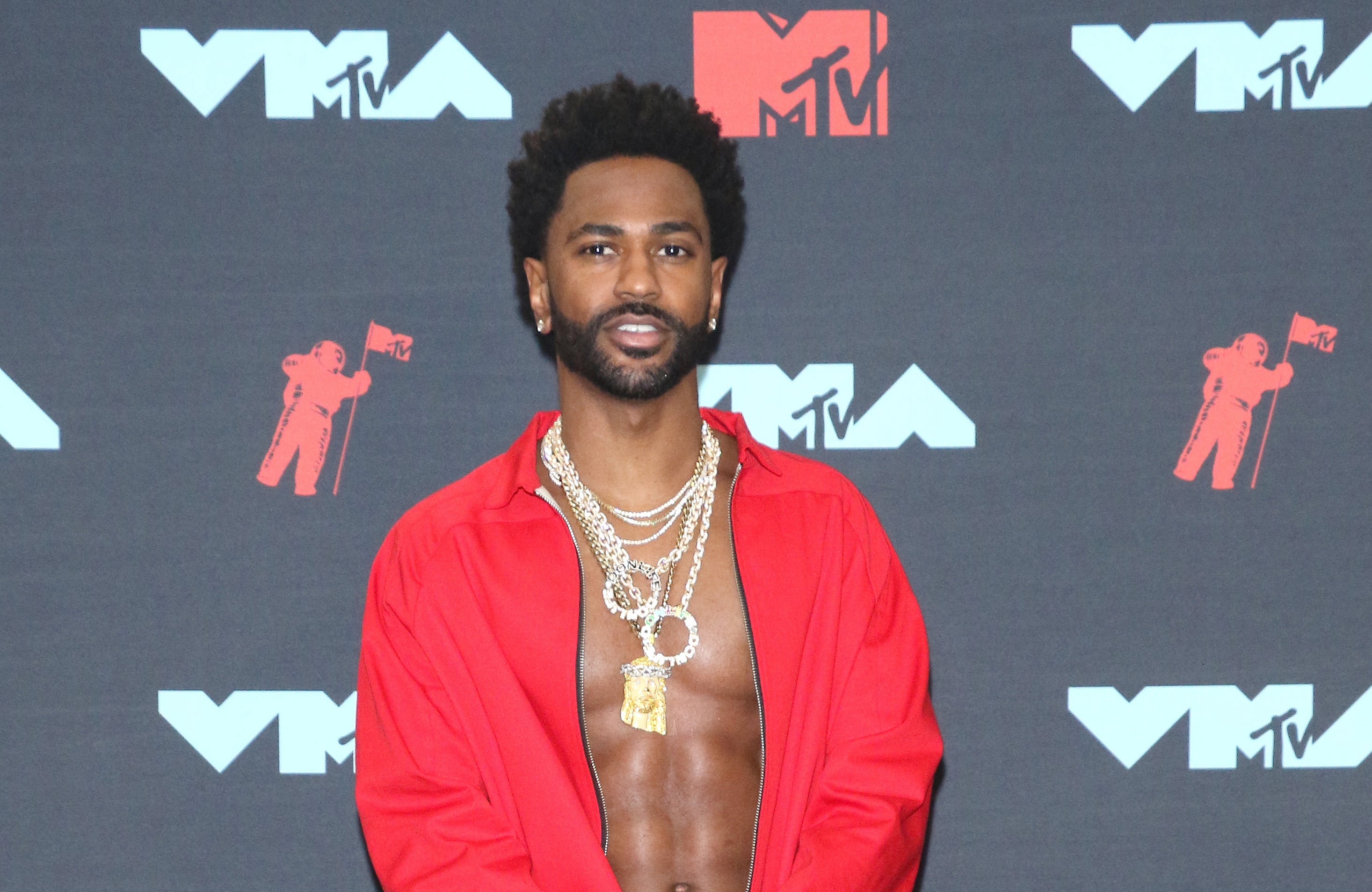 Rapper Admits His Abs Are ‘Unfortunately Real’ Amid Implant Rumors