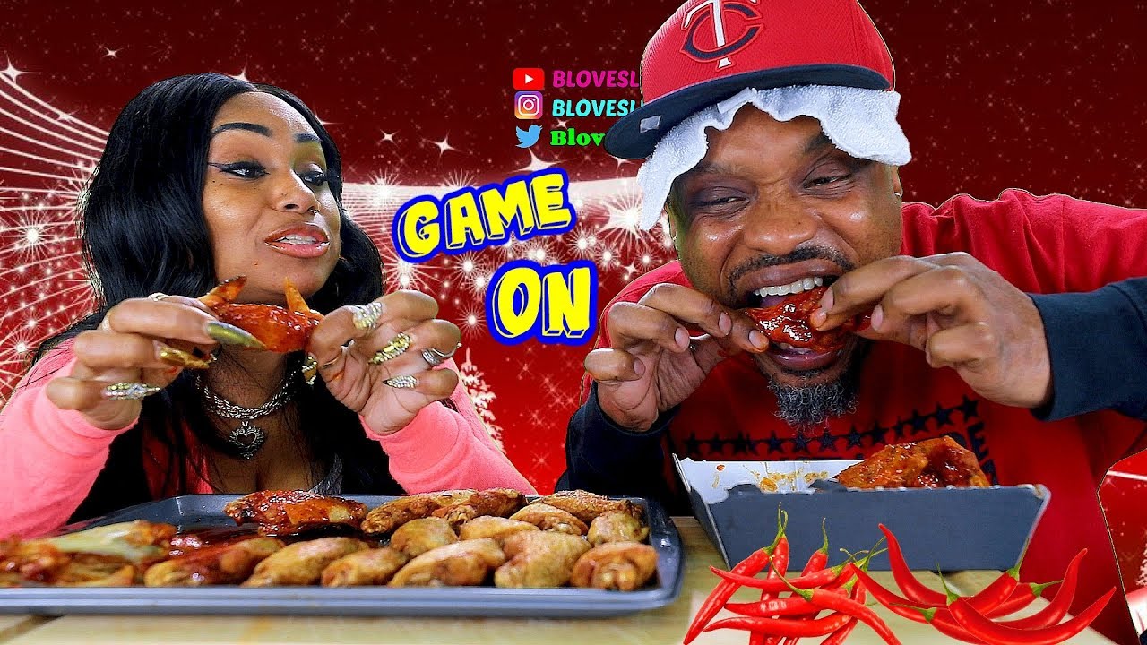 Trying spicy wings with my younger brother