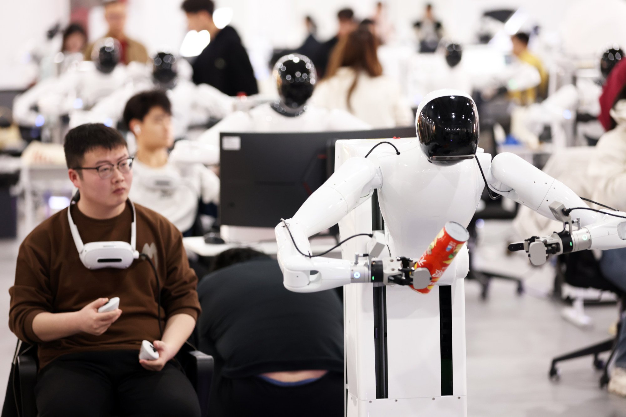 Robot maker AgiBot seeks stake in Shanghai-listed firm in potential ...