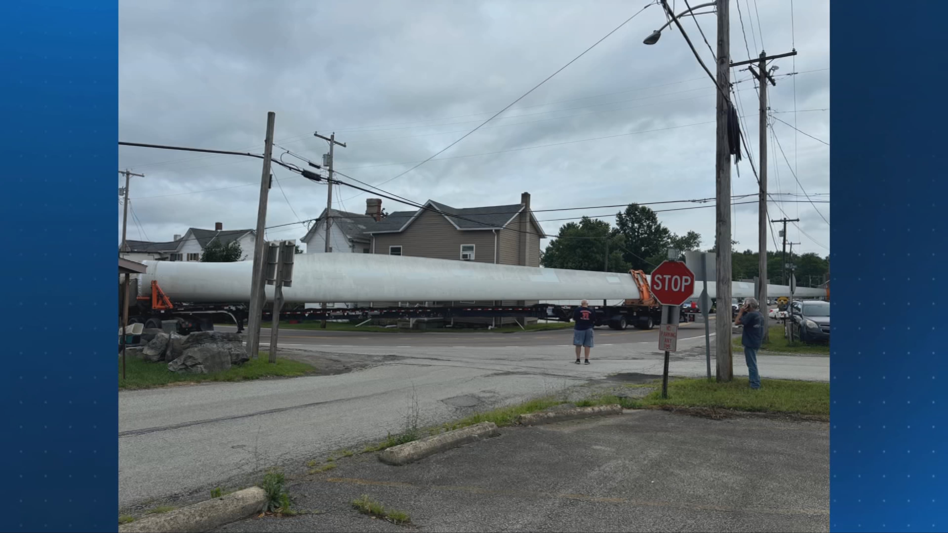 Wind turbine blade on truck heading to Iowa hits building near sharp ...