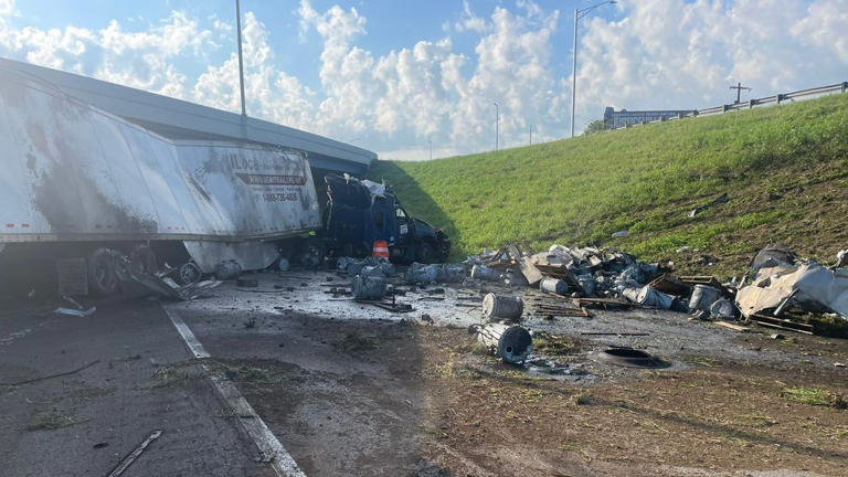 Overturned tractor-trailer closes I-40 West, causing major delays