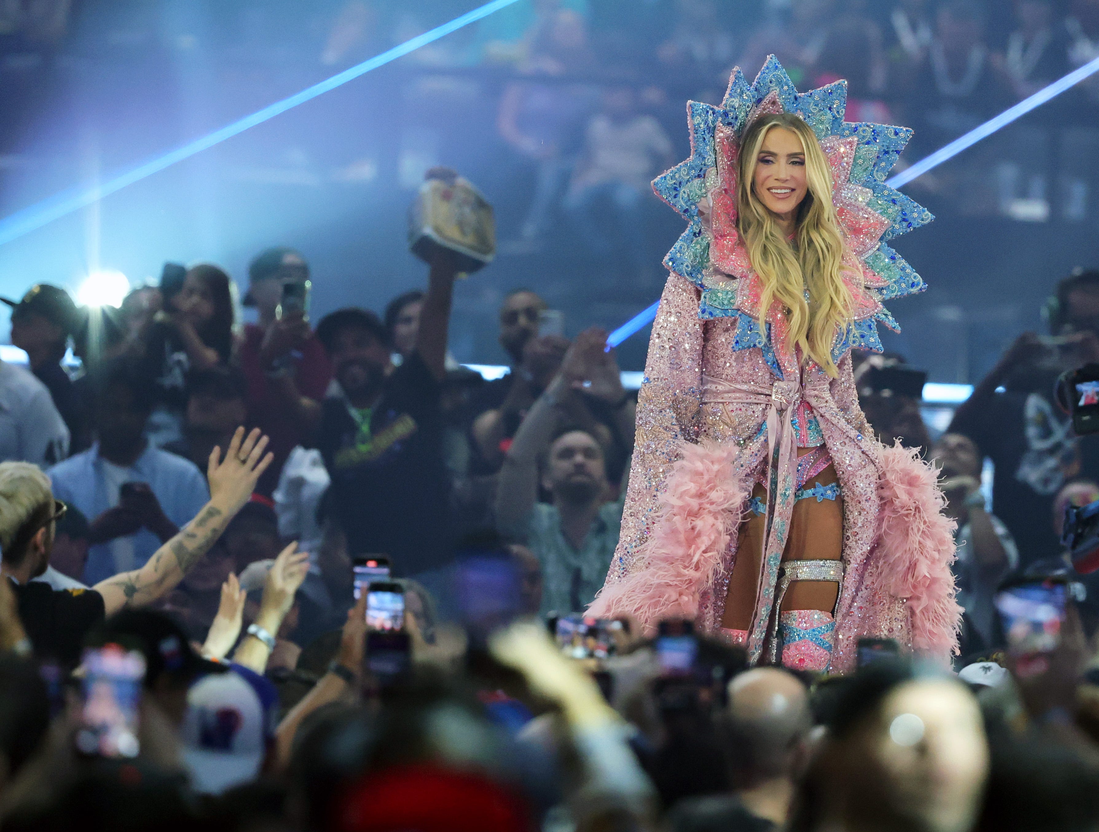 New woman's champion at WWE Evolution. Naomi cashes in at women's PLE