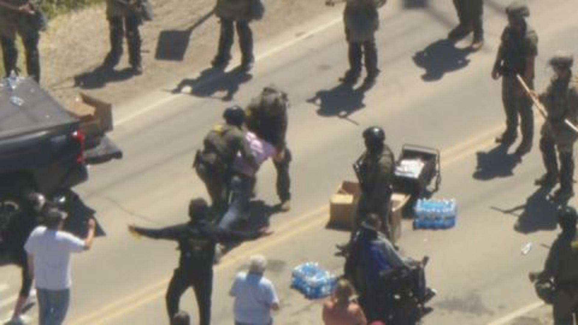 Protestors fight with ICE agents, as raids in California turn violent