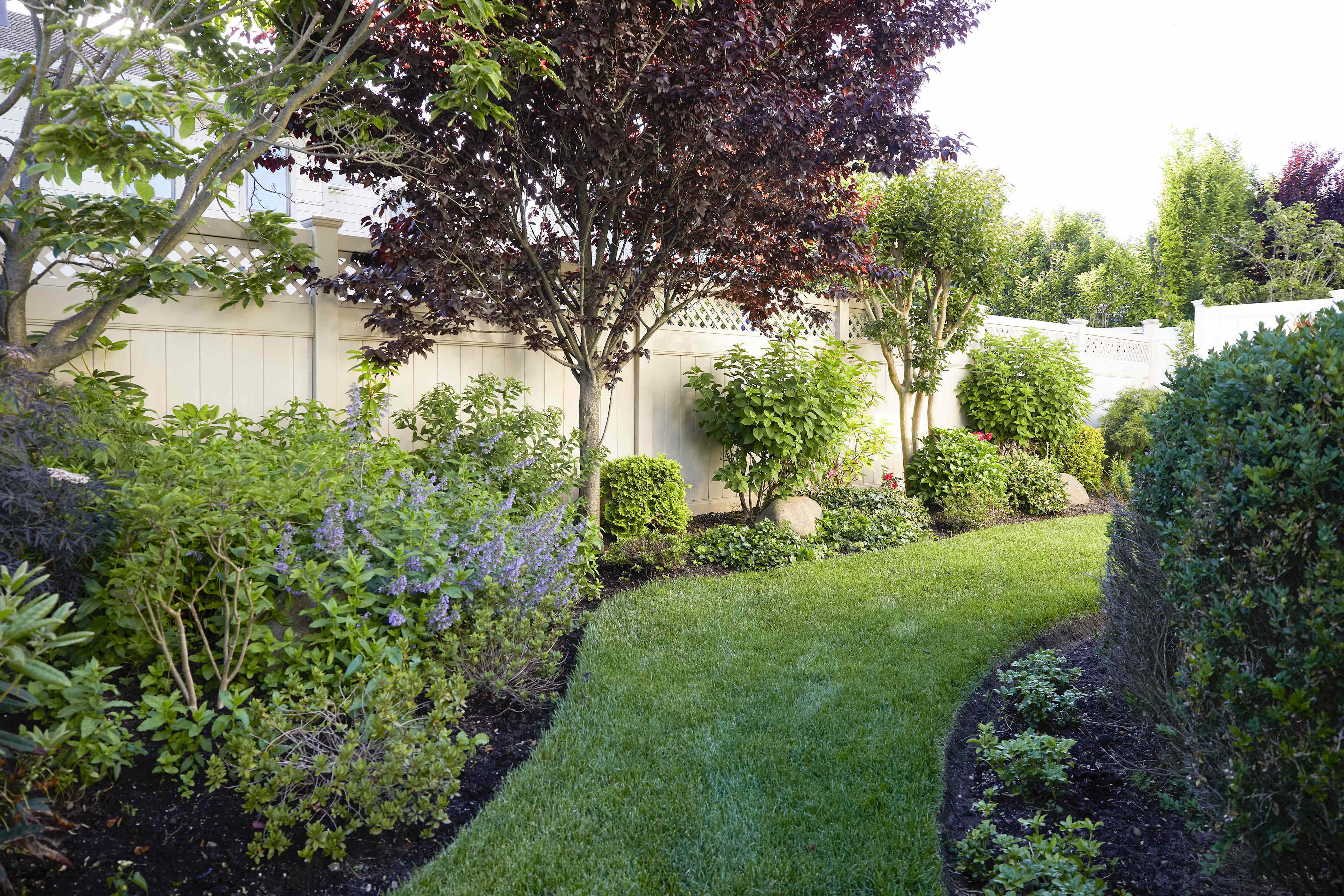 How to Keep Grass From Growing in the Garden—So Your Plants Can Truly ...