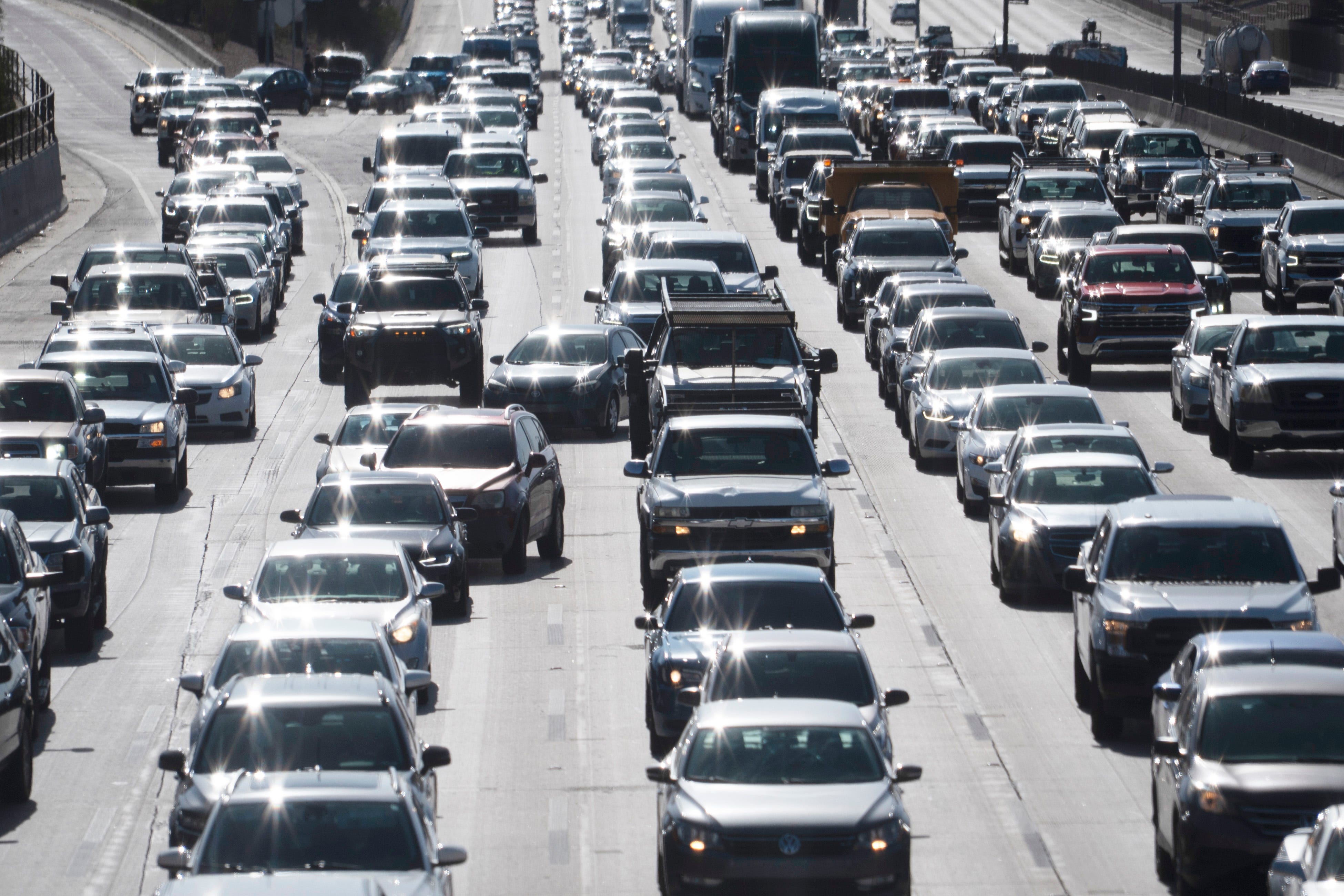 Can I wear earbuds or headphones while driving? What California law says