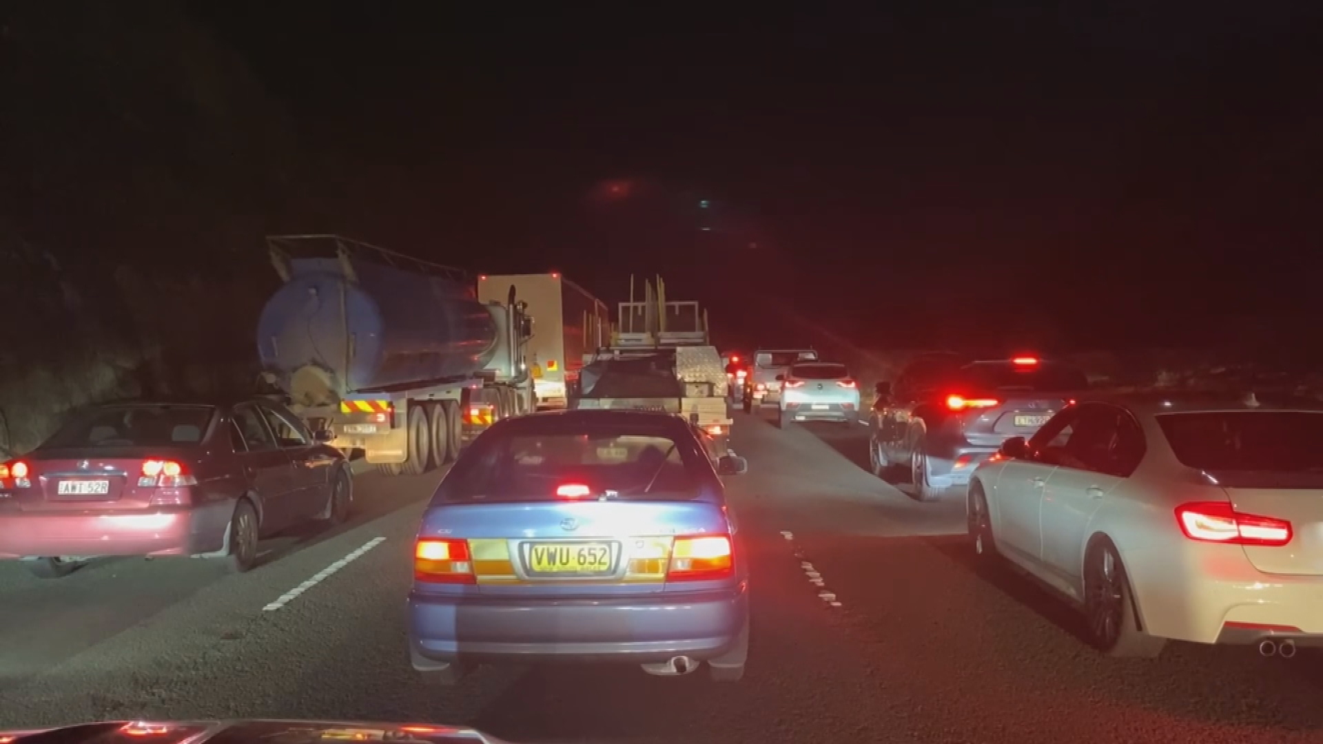 Five people injured after truck crashes into cars following pile-up