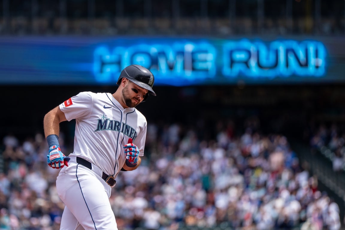 Incredible photos capture Cal Raleigh's torrid home run pace