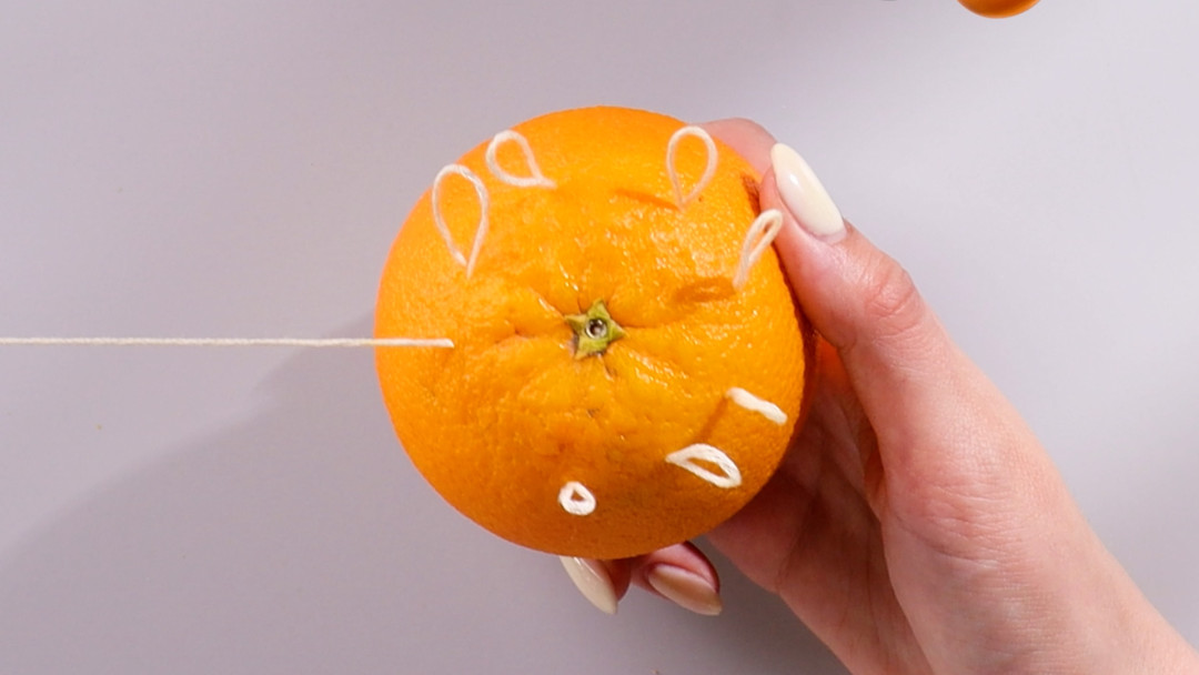 Mastering the Invisible Stitch Technique with an Orange