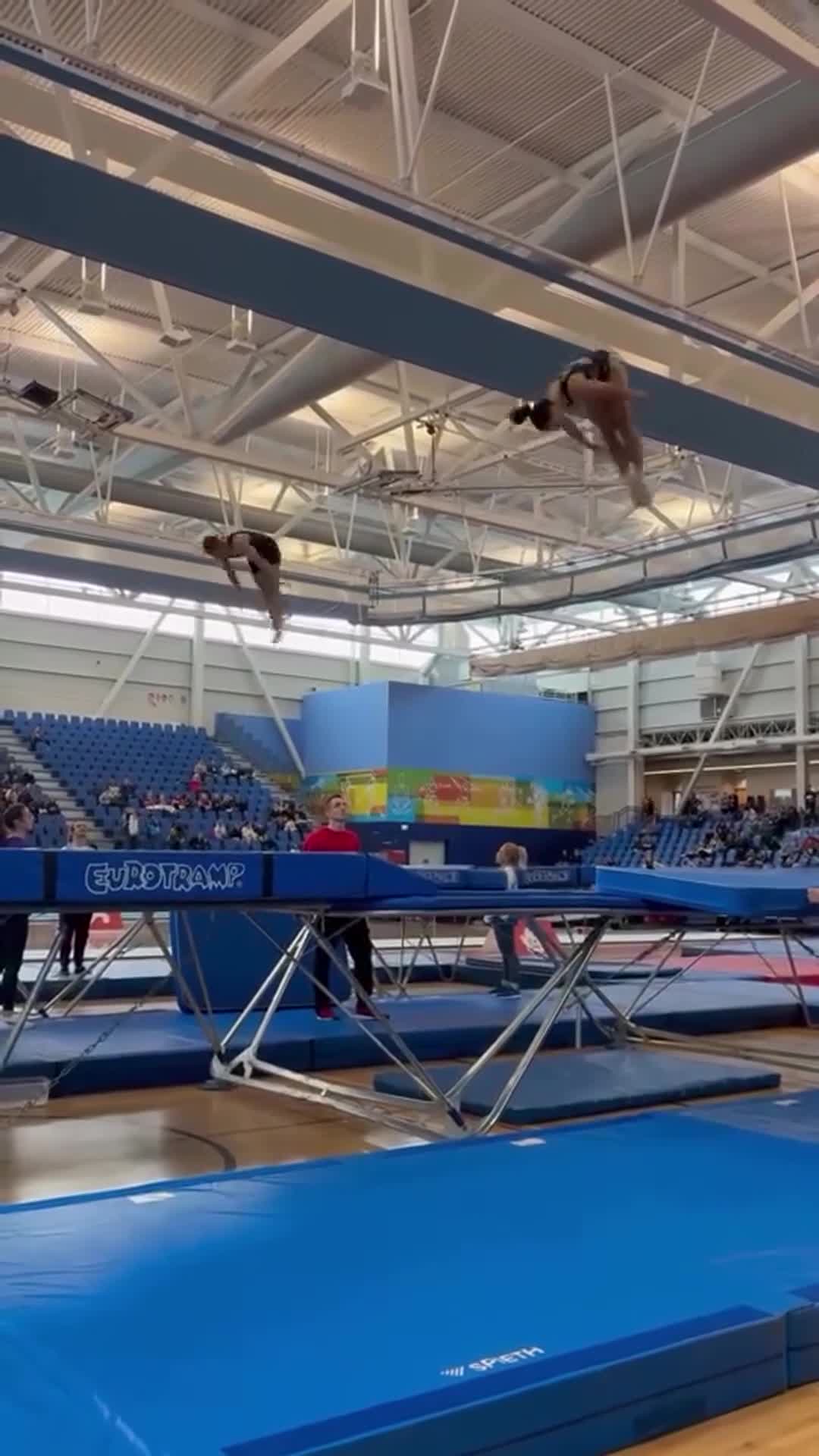 Synchronized Trampoline Gymnastics Performance