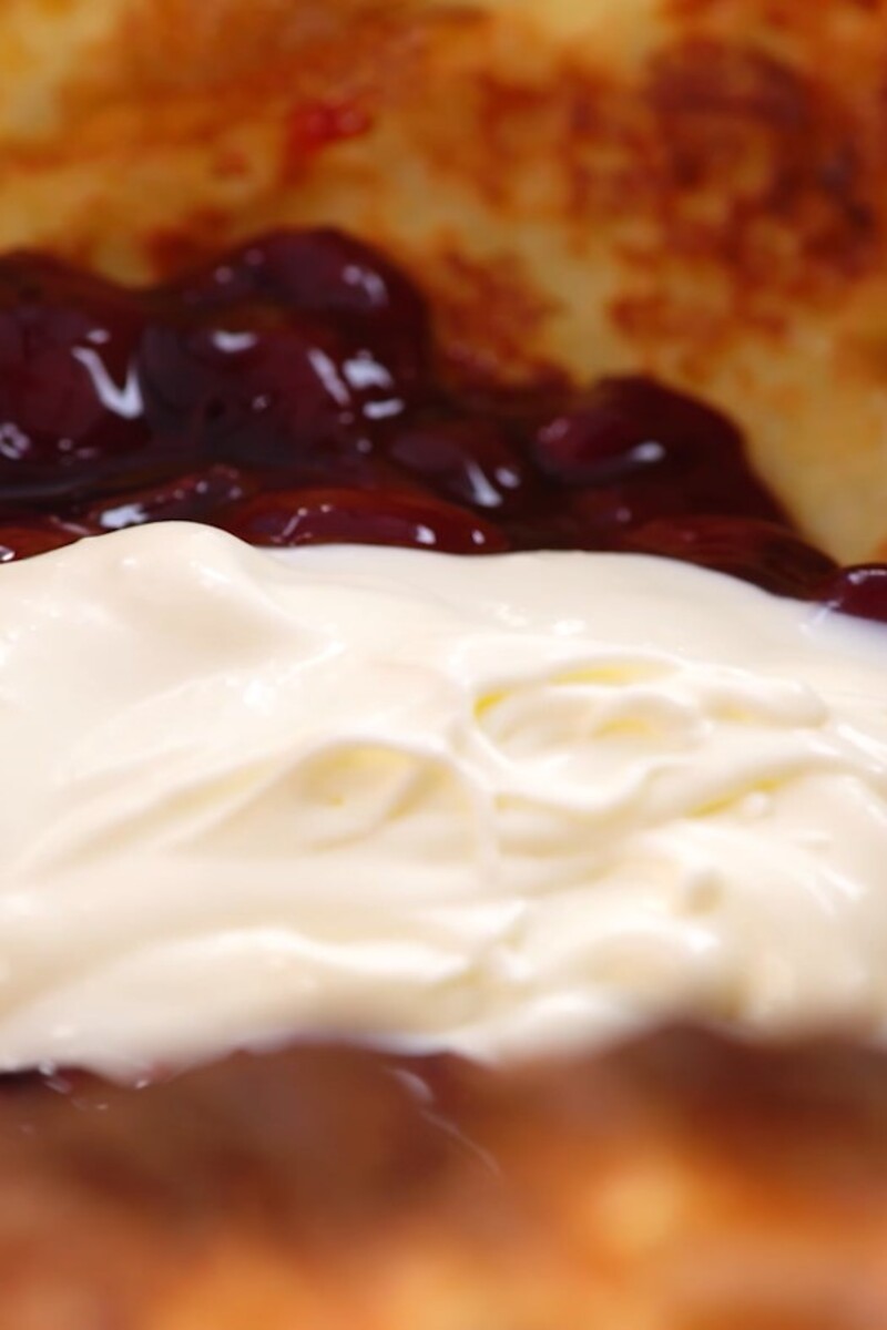 Dutch baby pancake with sour cherry sauce