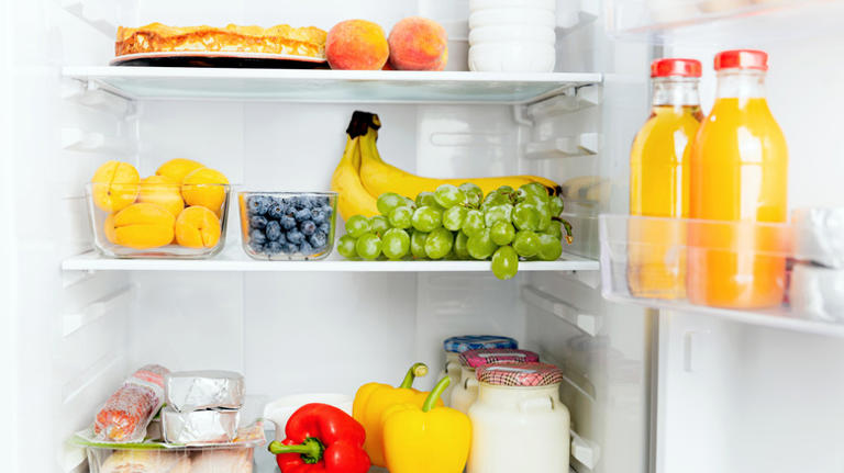The Clever Dollar Tree Solution For Organizing Cluttered Fridge Doors