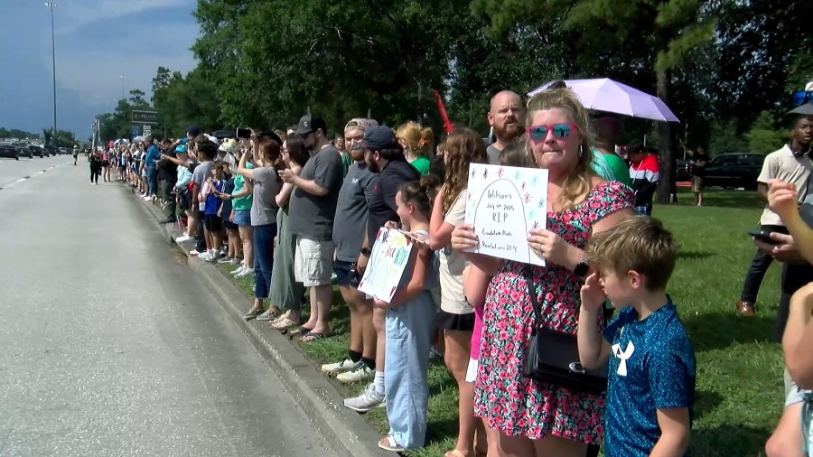 Hundreds Line Roadway to Honor the Wilson Family