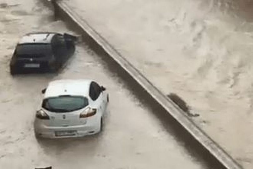 Spain hit by storm and hail warning as cars underwater after torrential ...
