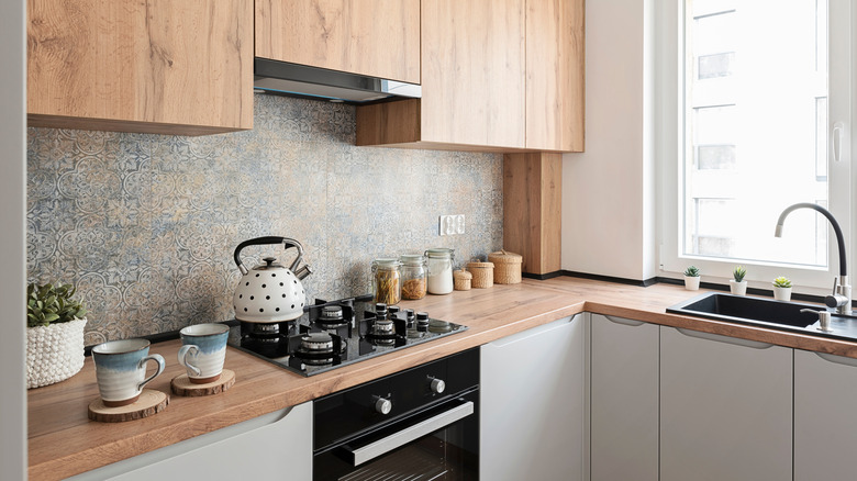 Add Extra Prep Space To A Small Kitchen With This Countertop Feature