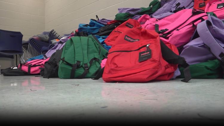 More than 1,000 backpacks donated to students at annual school supply ...