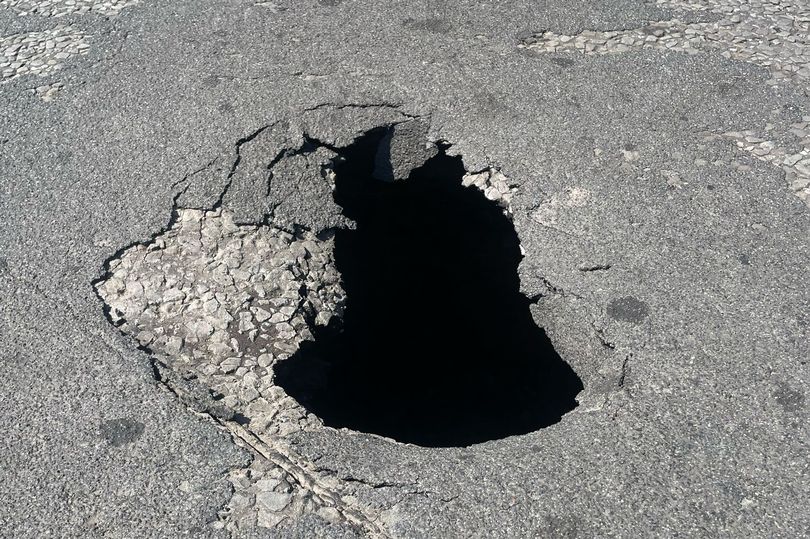 Key city road partially closed after sinkhole appears