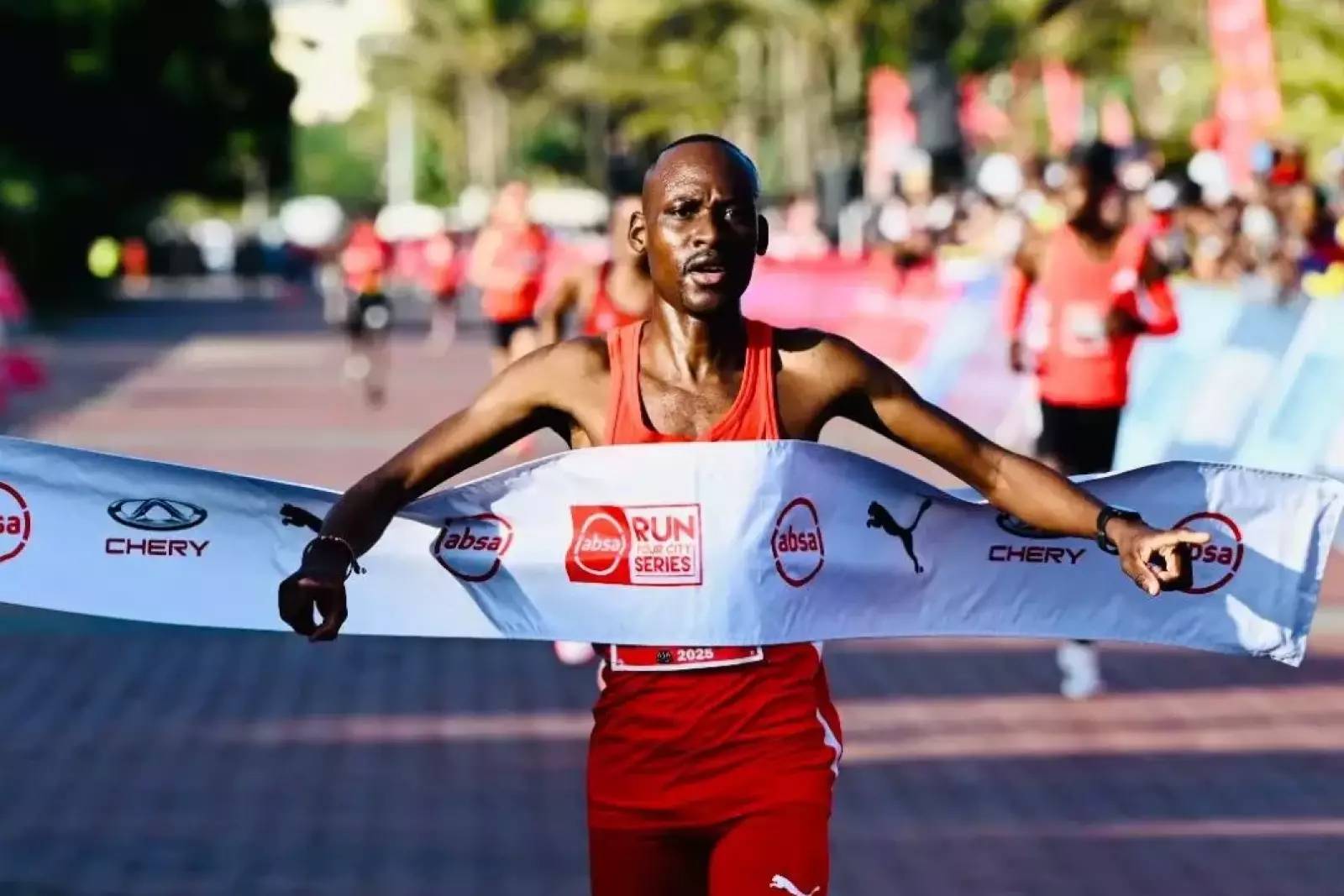 Kabelo Mulaudzi secures back-to-back victories at the Absa Run Your ...