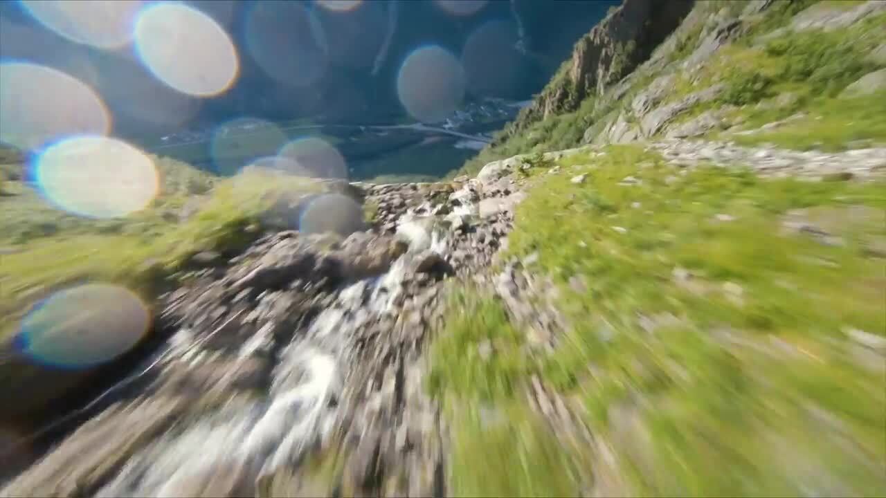 Drone Dives Down Narrow Norwegian Cliffs