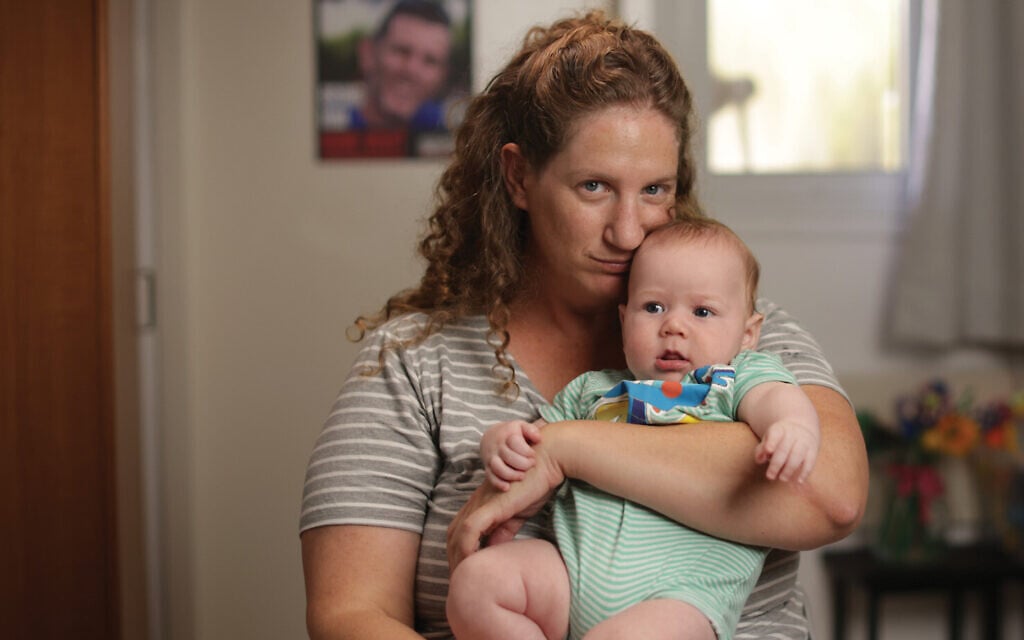 Wife of Tal Haimi waiting to bury her husband, whose body remains held ...
