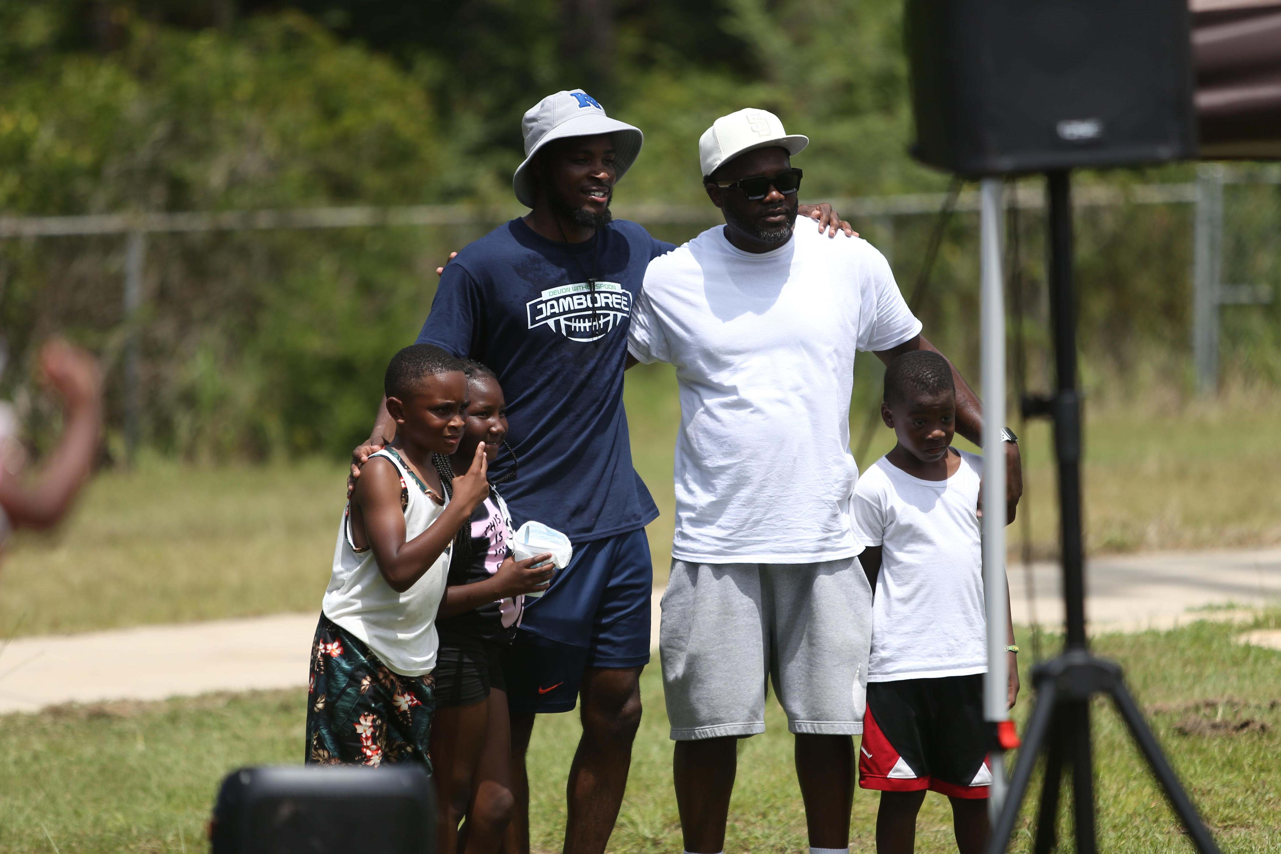 'We're here to build a better place': NFL star Devon Witherspoon hosts ...