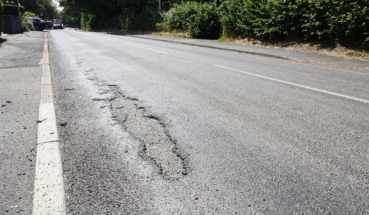 Woman narrowly avoids being hit by car after flipflop sticks to ‘molten ...