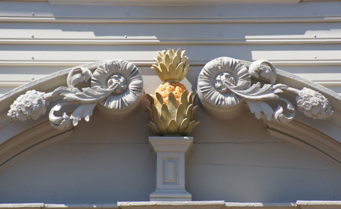 Pineapples adorn homes across Newport. It's more than just a decorative ...