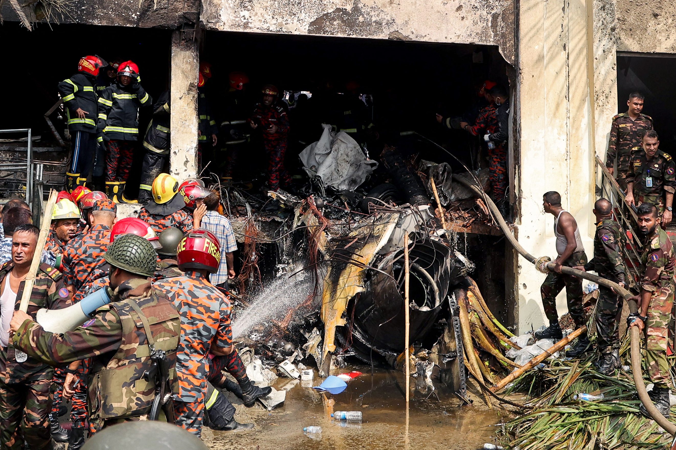 Bangladesh air force jet crashes into school, killing at least 31