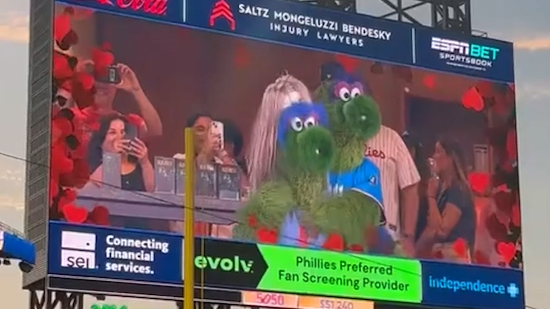 Sports fans, mascots reenact viral Coldplay concert 'Kiss Cam' moment