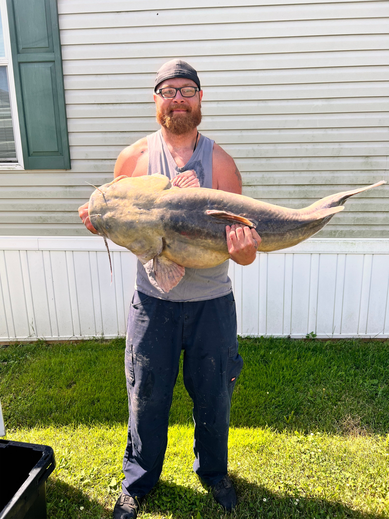 Newport man's catch of 64-lb. flathead catfish sets Michigan record